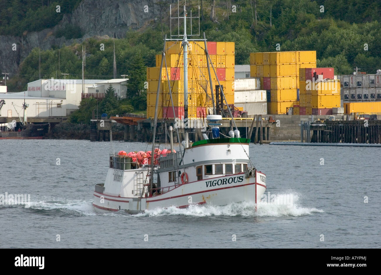 USA, Alaska, Ketchikan, Seine fishing boat heading out to fish with ...