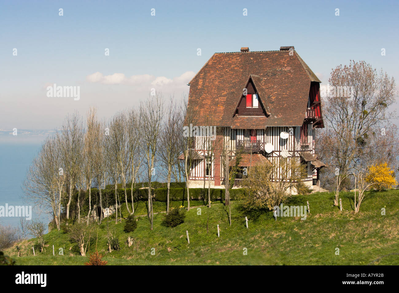 Traditional Normandy Architecture - a house on cliff top overlooking ...