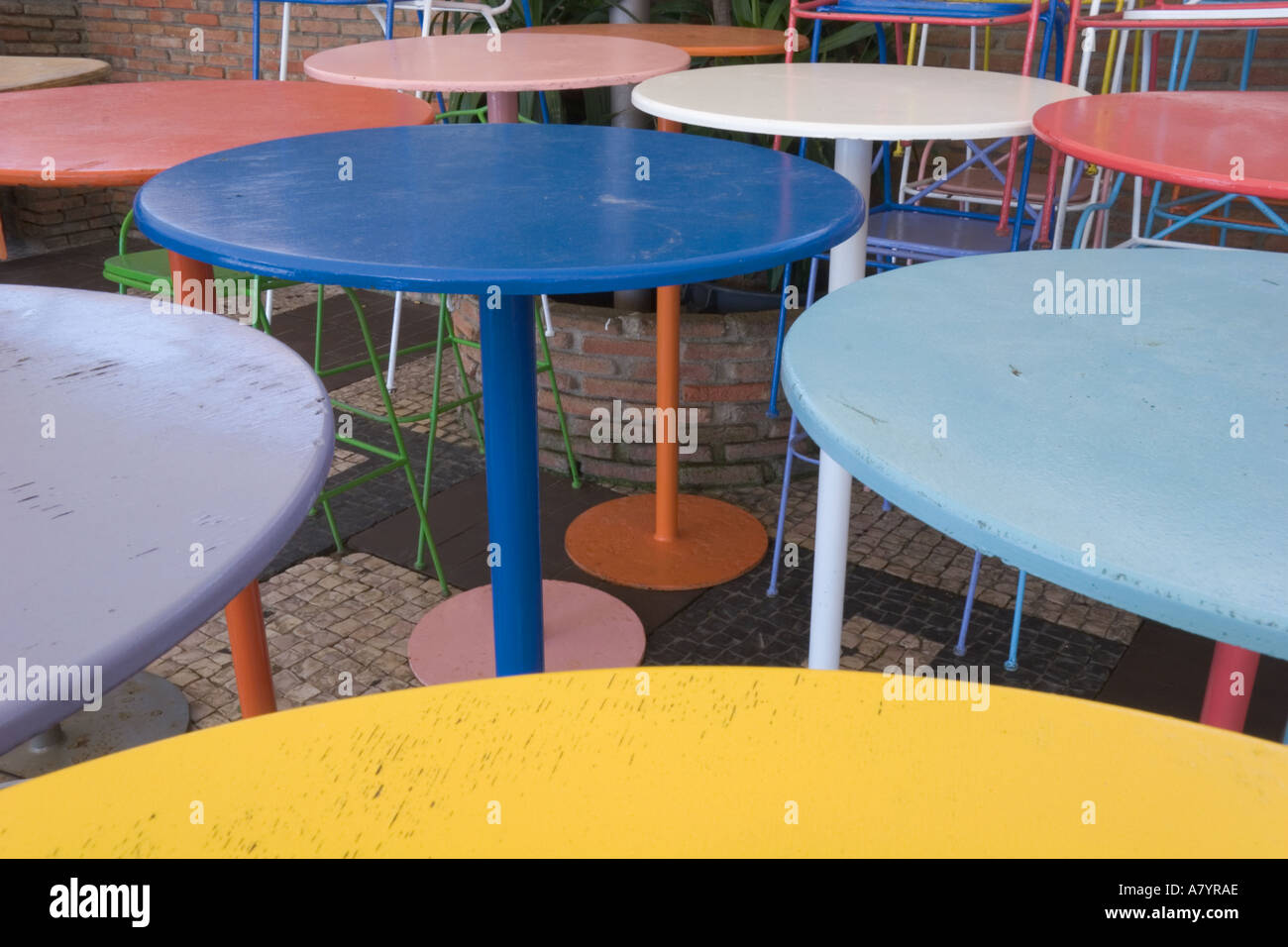 Round tables of many colours Stock Photo - Alamy