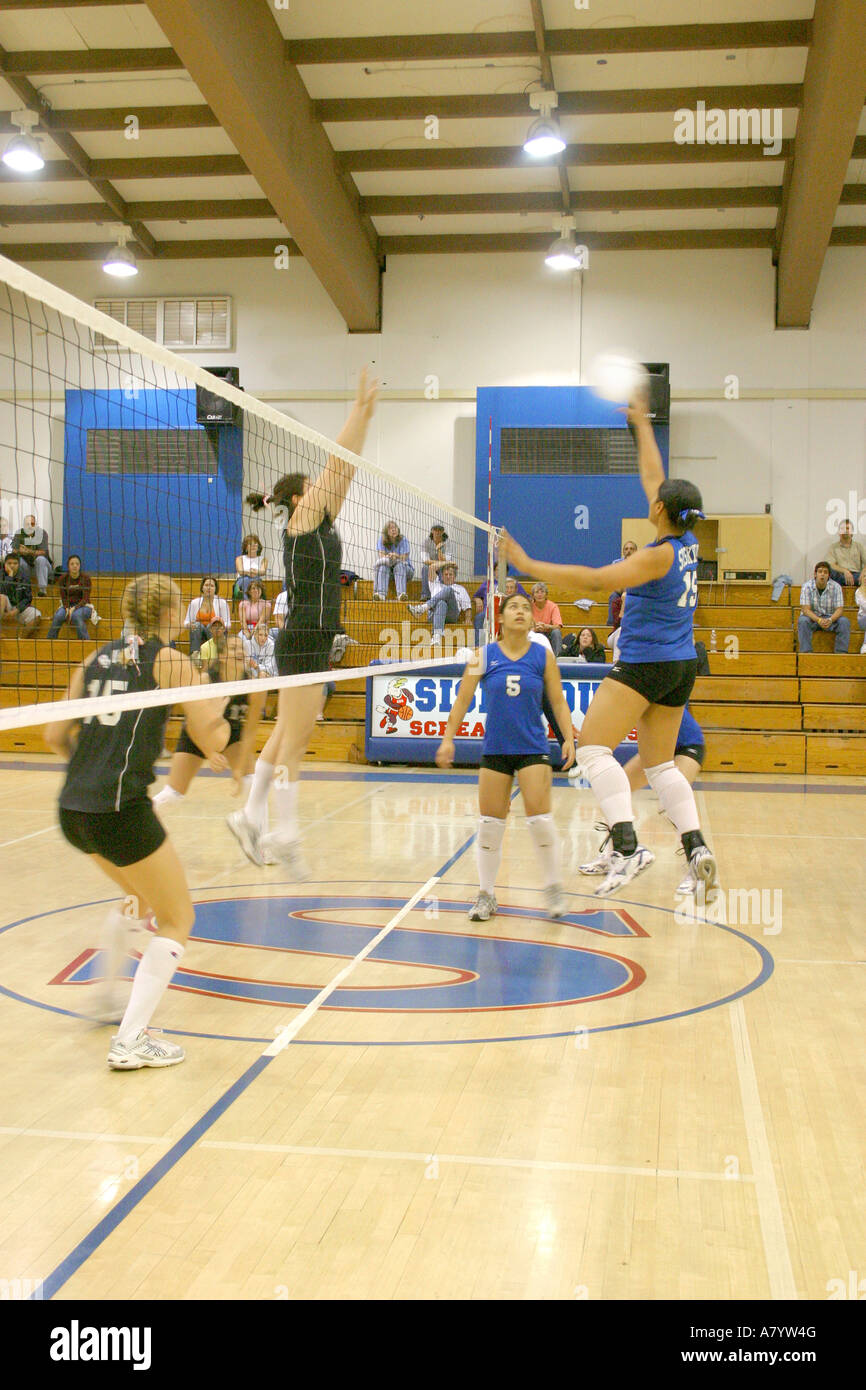 USA, California, Women's college indoor action volleyball match Stock ...