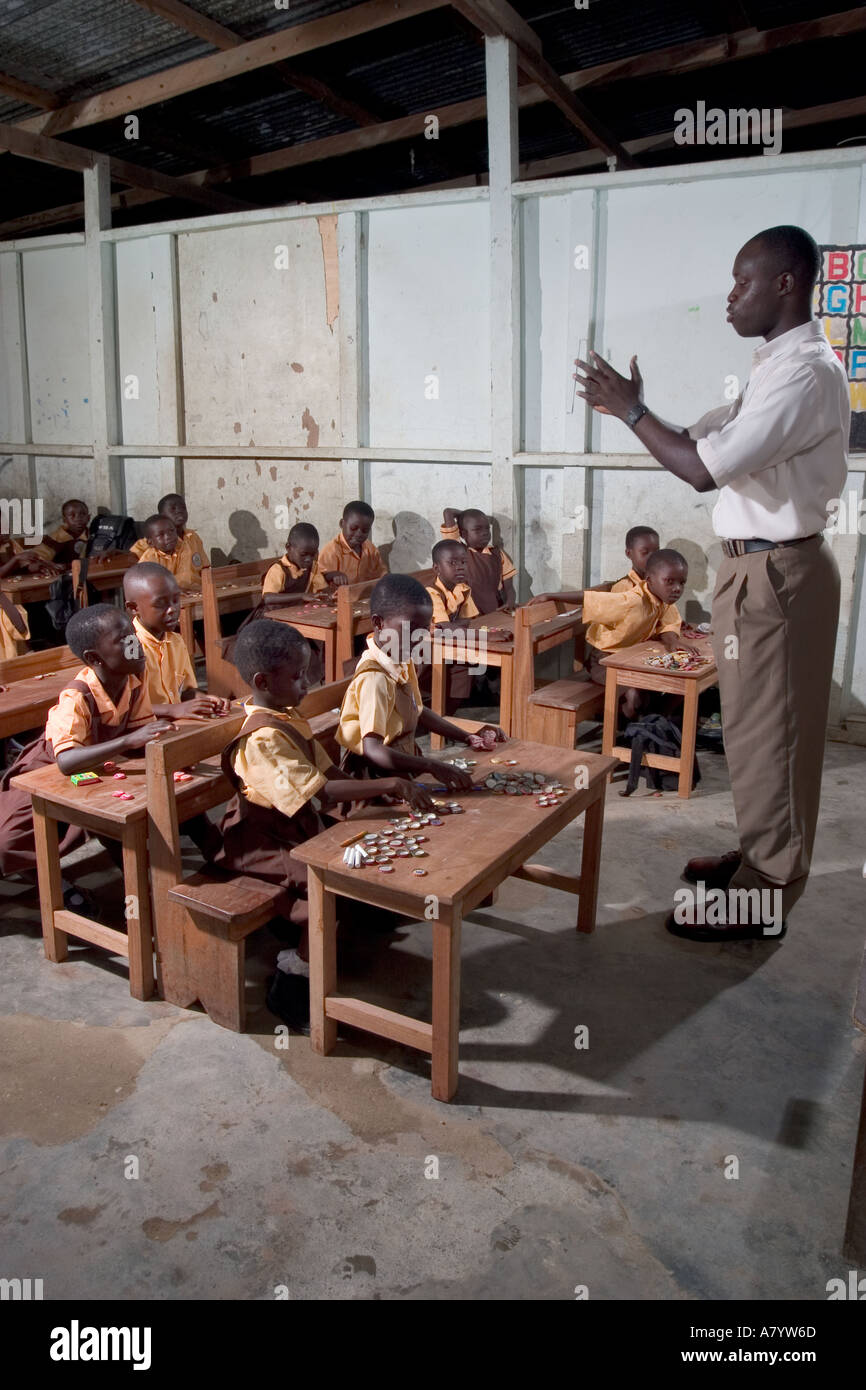 Inside classroom of mixed group of young girls and boys junior school ...