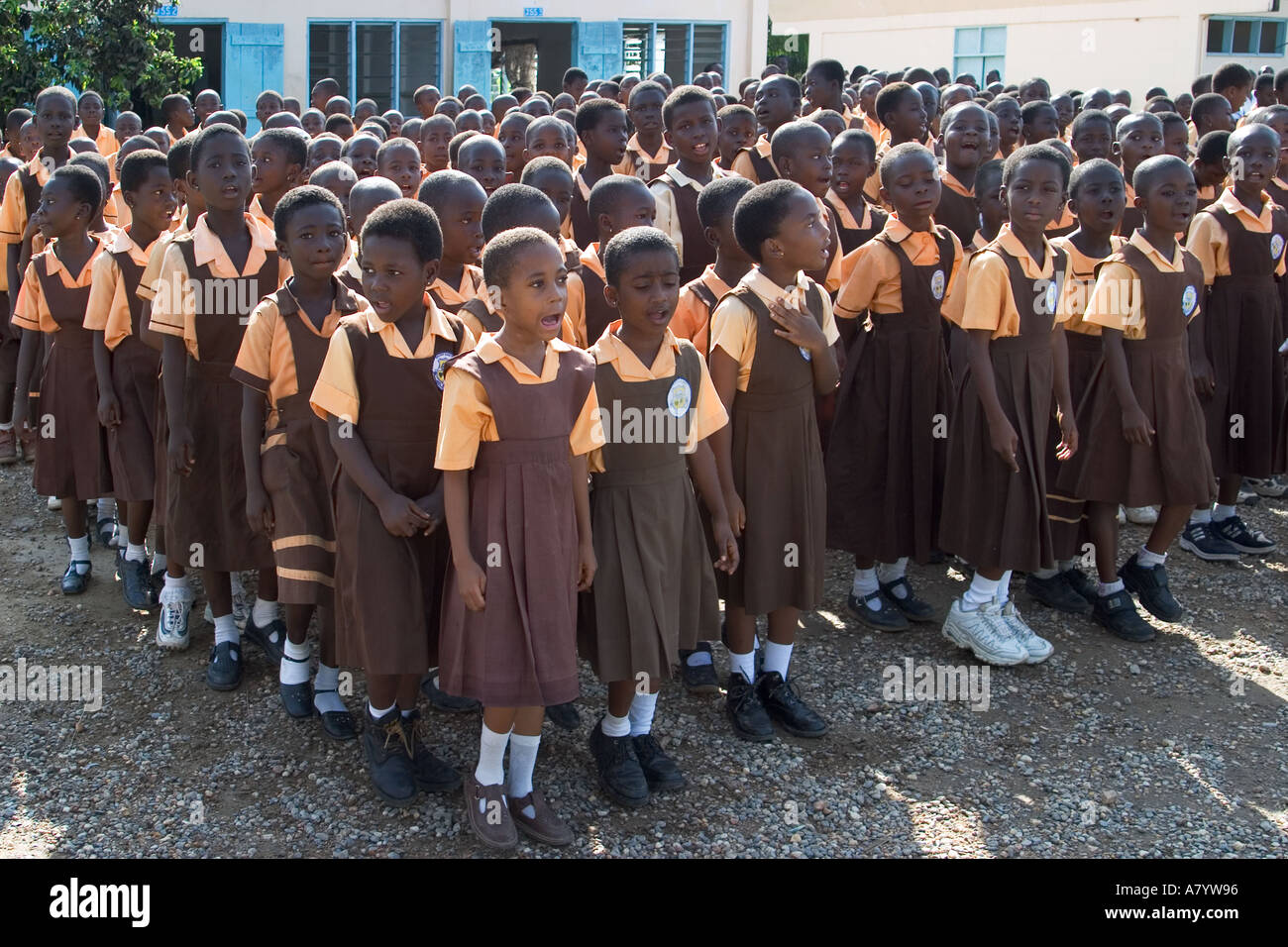 Mixed group of school children at assembly before classes in Ghana ...