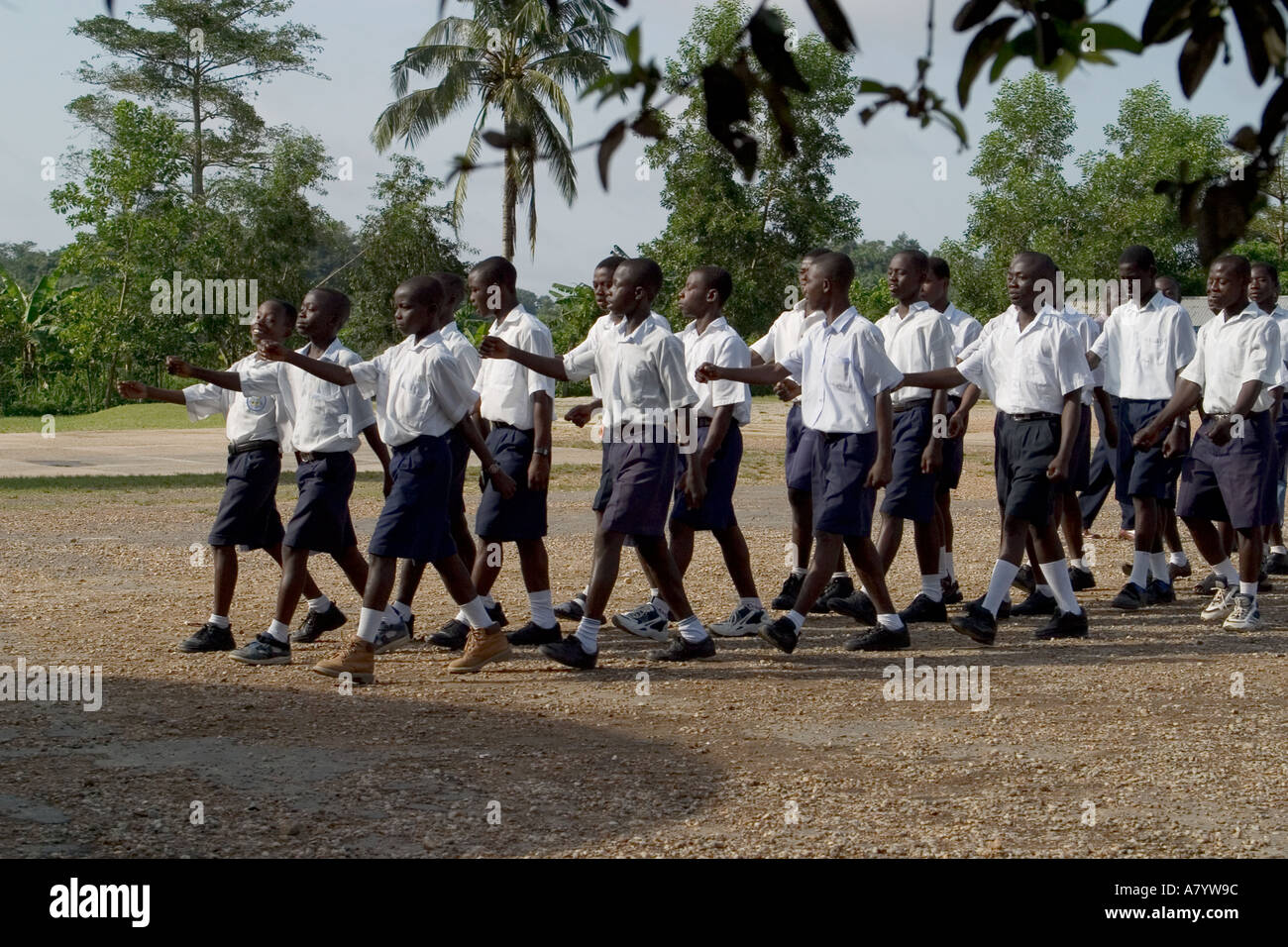 Group of senior boy students in school uniforms outside marching into ...