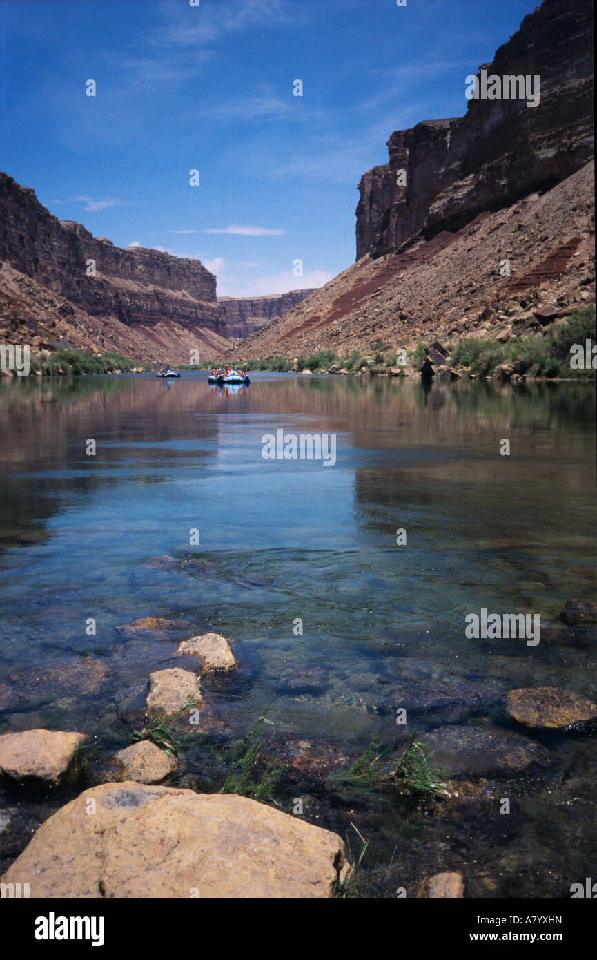 Oar powered rafts drift down the Colorado River deep inside the Grand ...