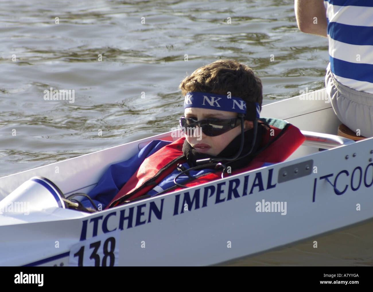 a female cox at a rowing event at Chertsey on the River Thames Stock ...