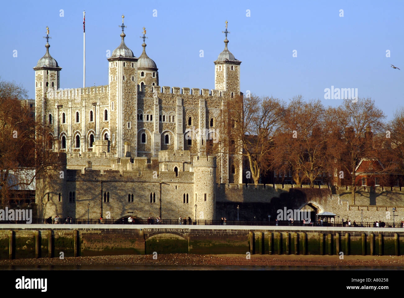 london the tower of london view of path alongside river thames view ...