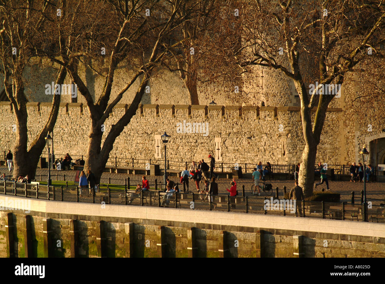 london the tower of london view of path alongside river thames view ...