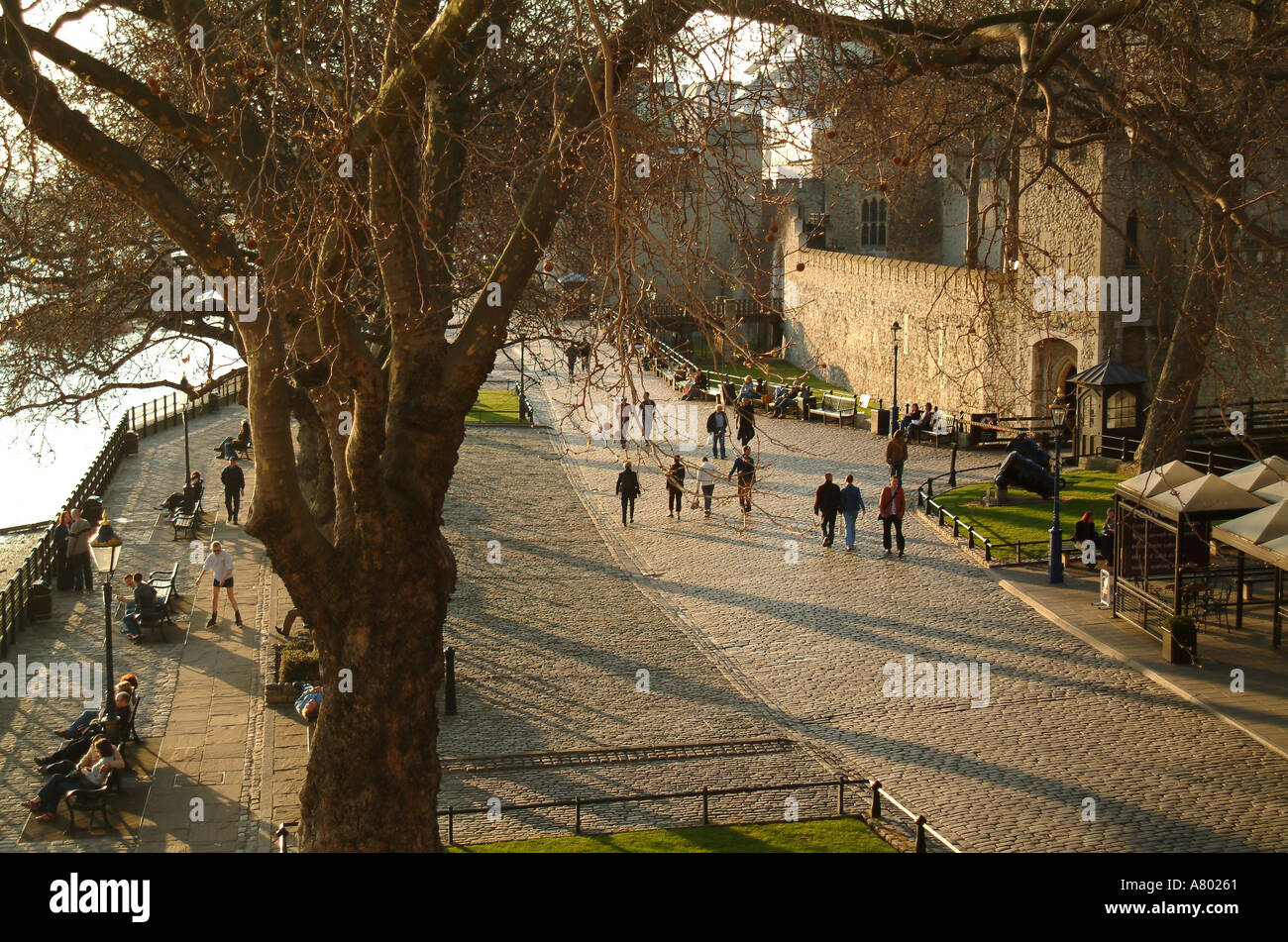 london the tower of london view of path alongside river thames view ...