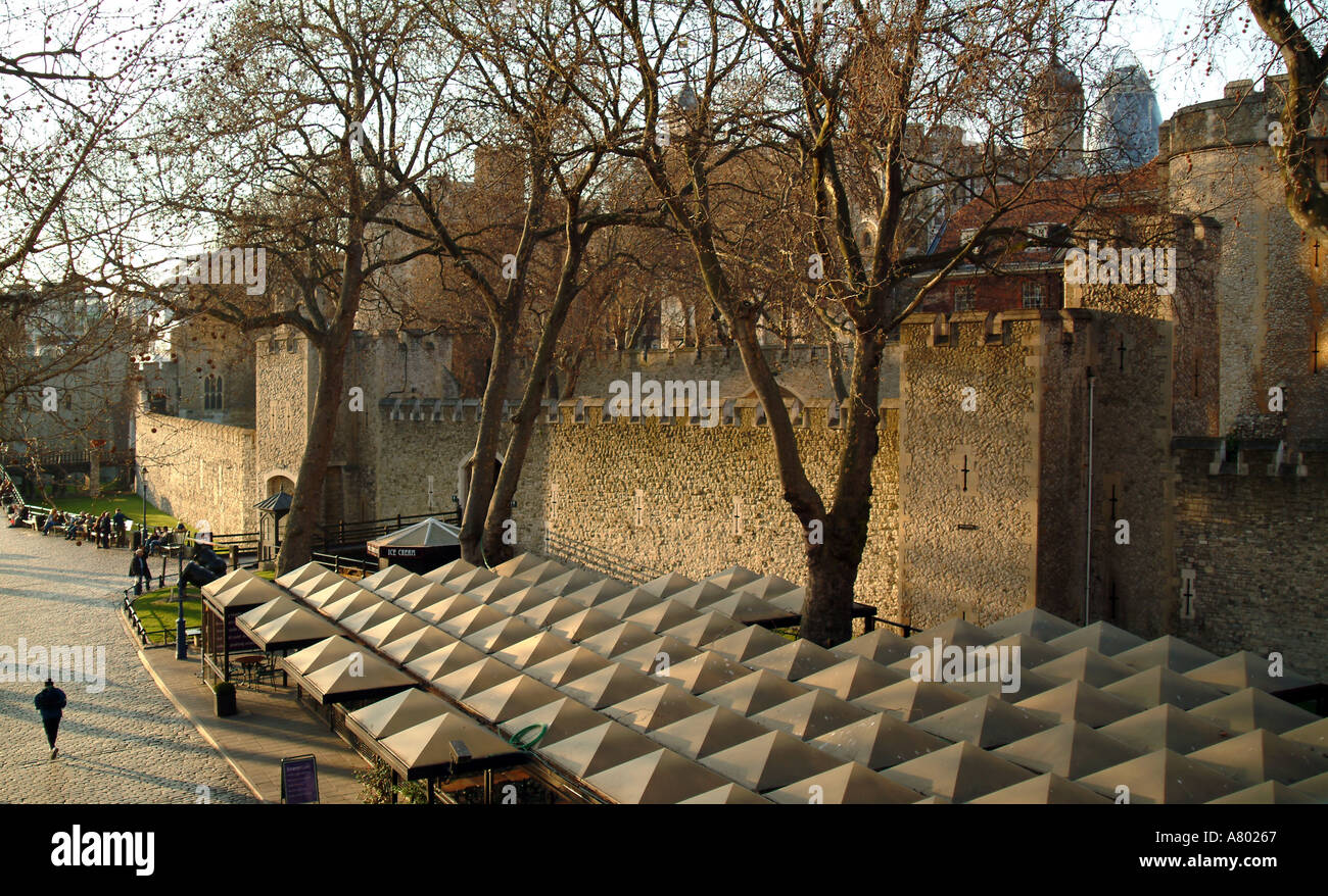 london the tower of london view of path alongside river thames view ...
