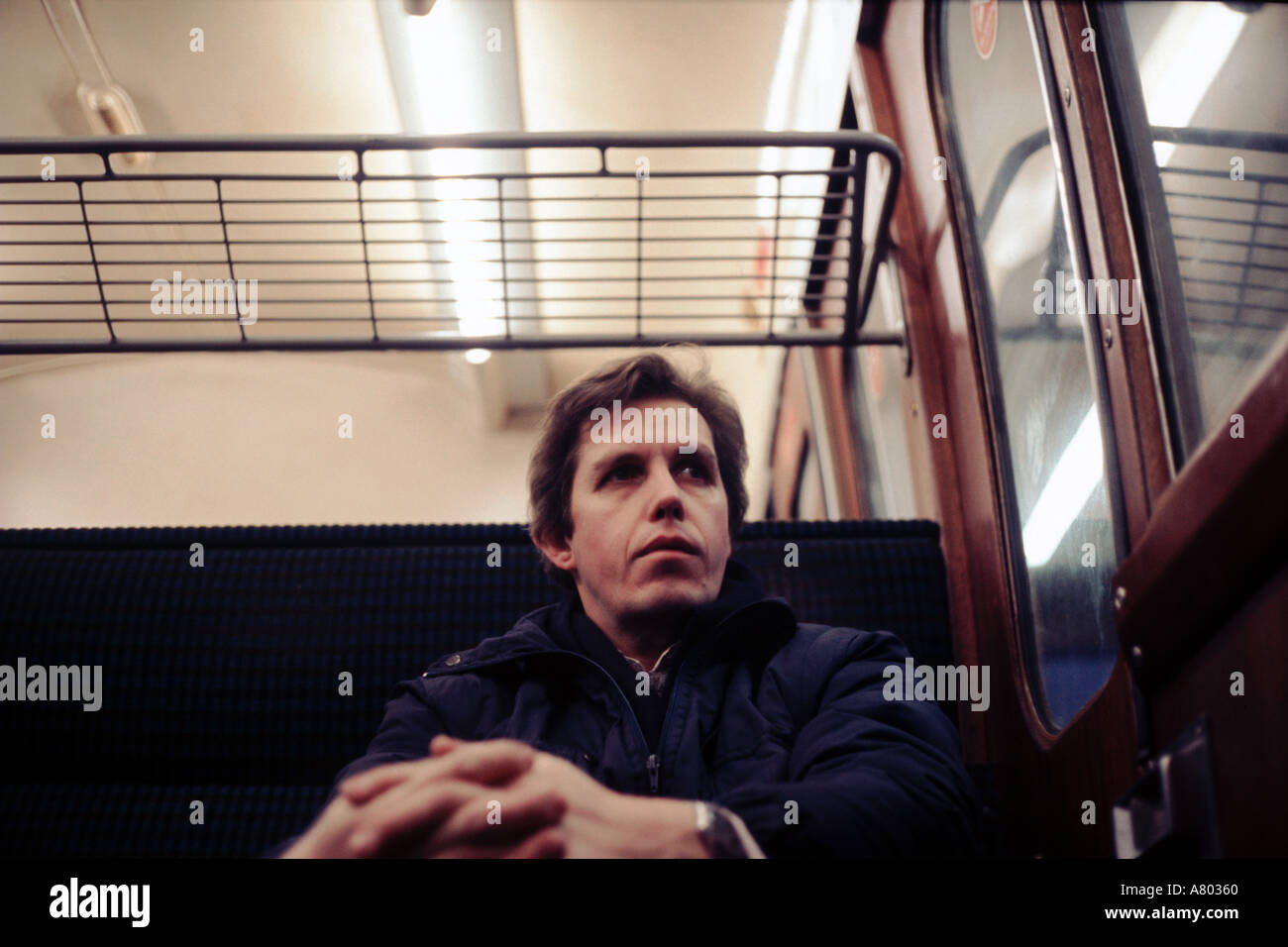 Man on a train in England SELF PORTRAIT Stock Photo - Alamy