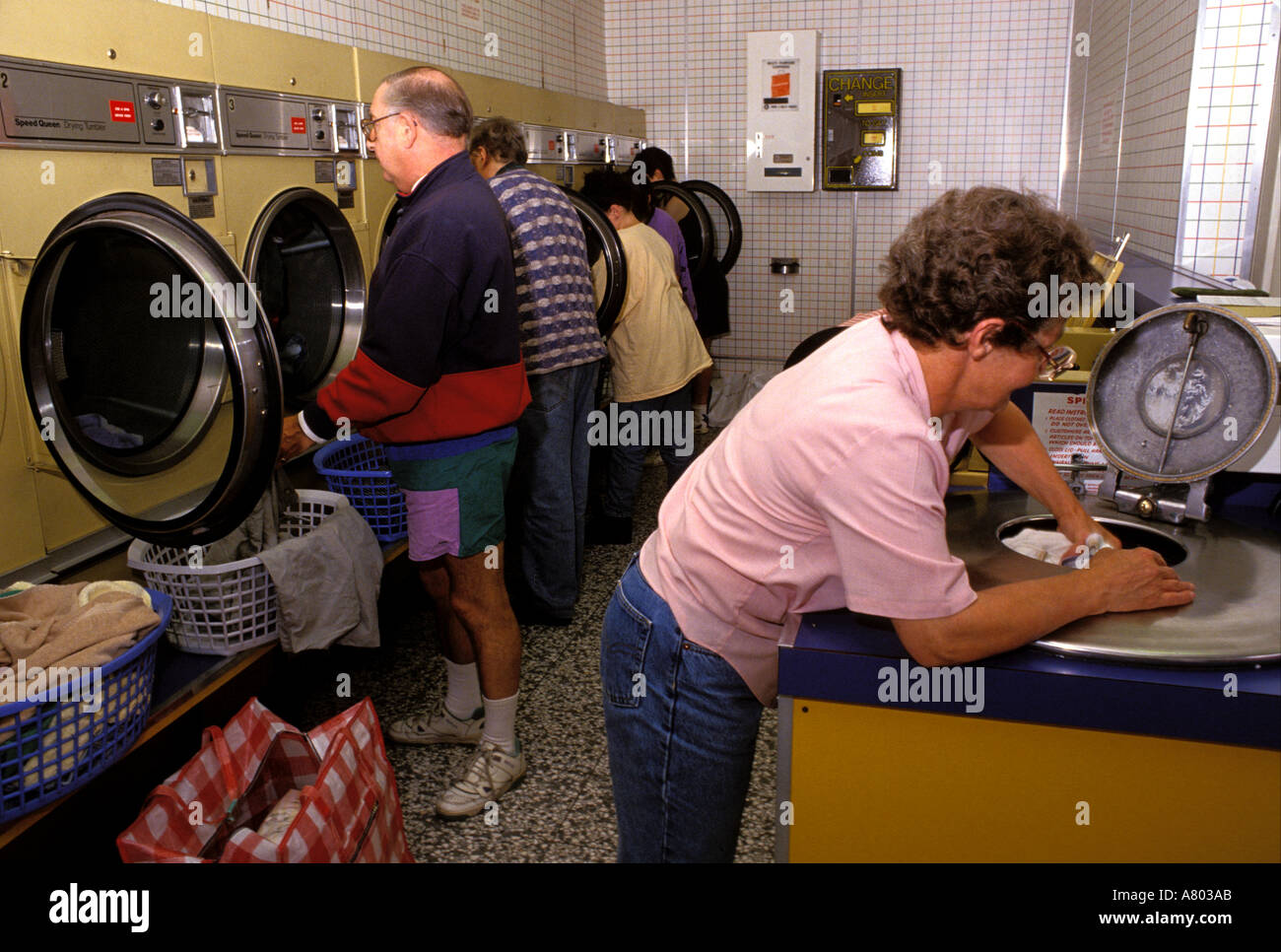 People doing their washing at the Launderette, London Stock Photo - Alamy