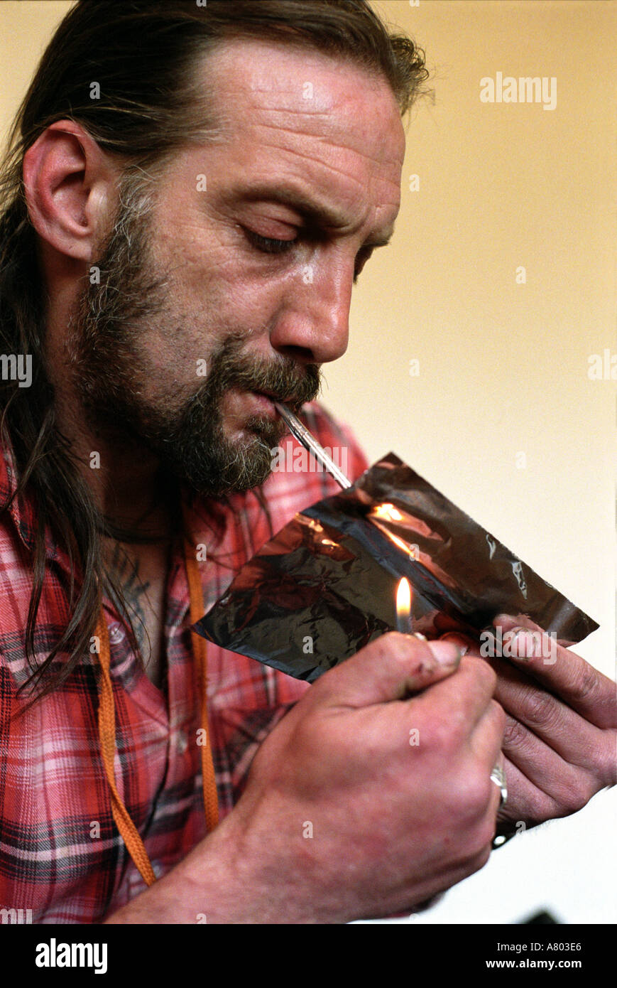 Drug addicts smoke heroin in hi-res stock photography and images - Alamy