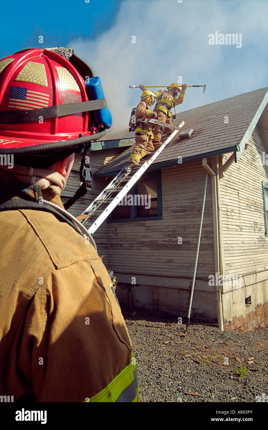 Firefighters Climb Ladder High Resolution Stock Photography and Images ...