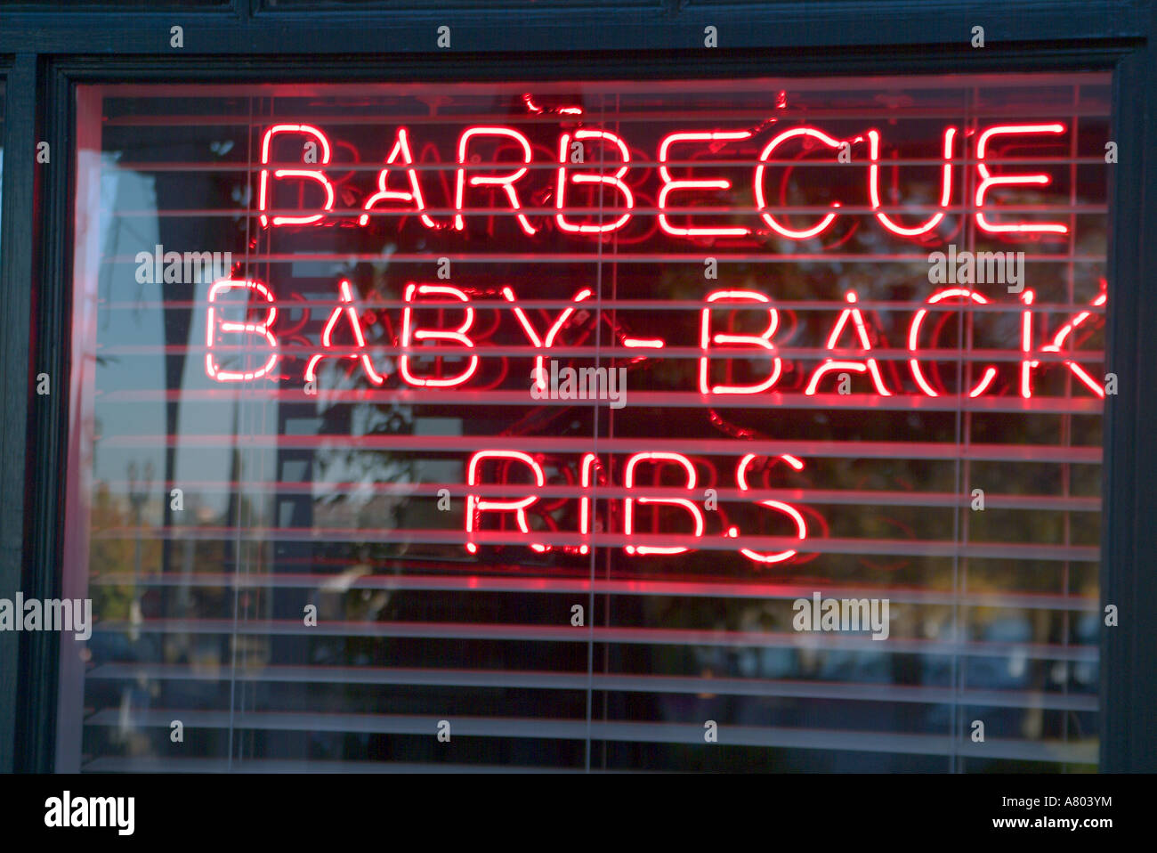A neon sign in the window of a restaraunt on the waterfront in Portland ...