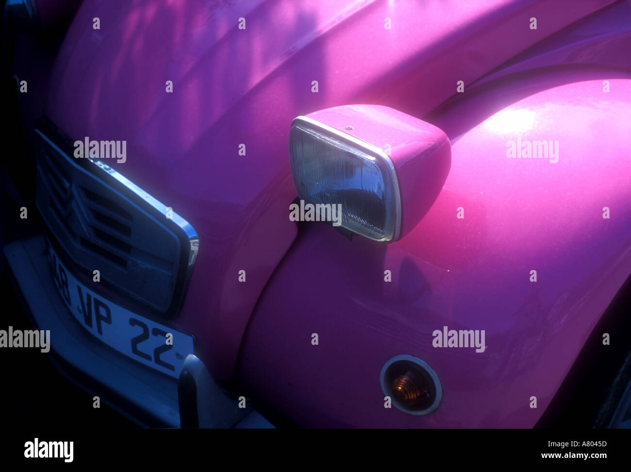 Detail of pink bodywork of classic Citroen 2CV car Brittany France ...