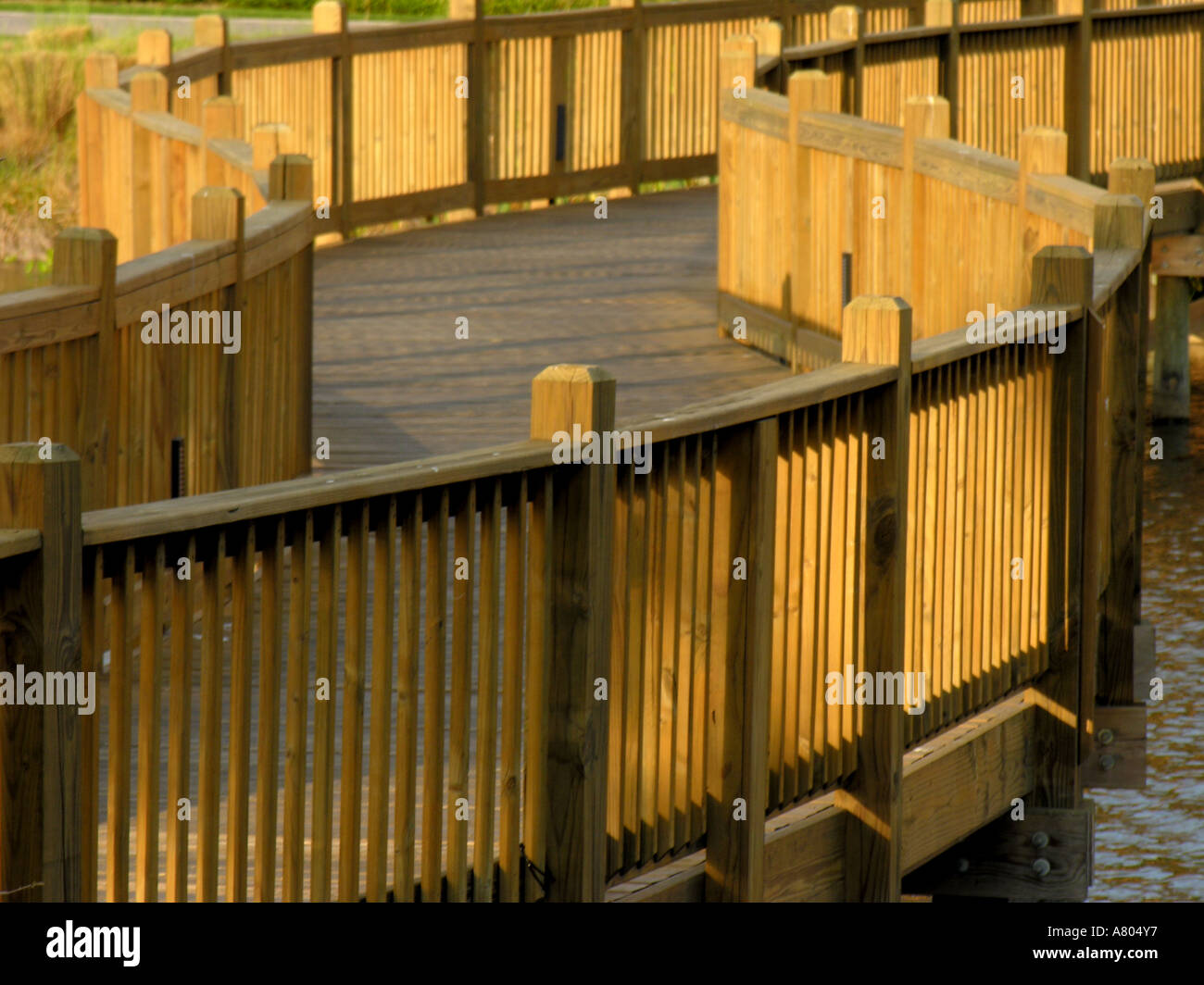 Decor winding twisting boardwalk Stock Photo - Alamy