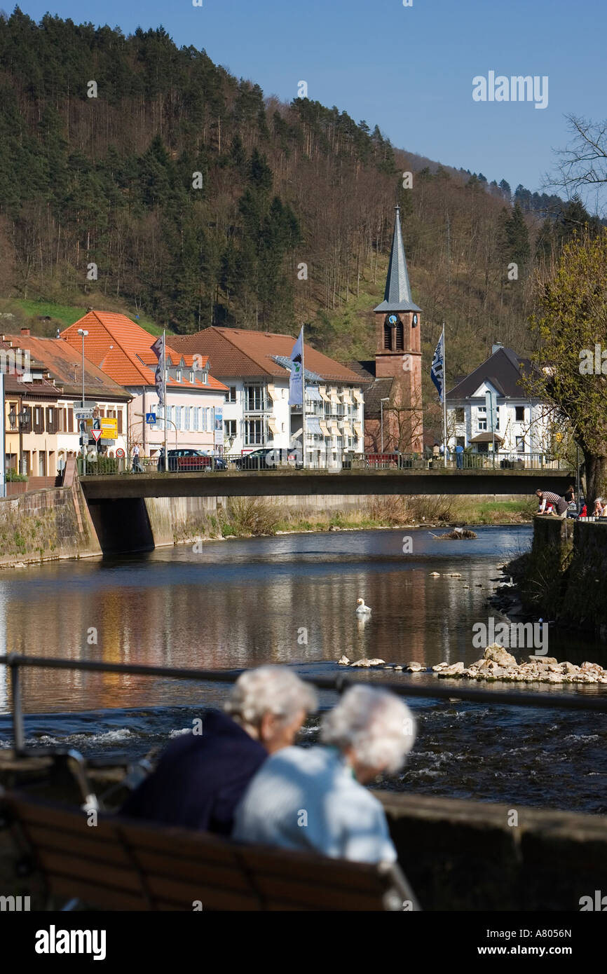 Elderly ladies seated on the banks of the River Kinzig Wolfach Black ...