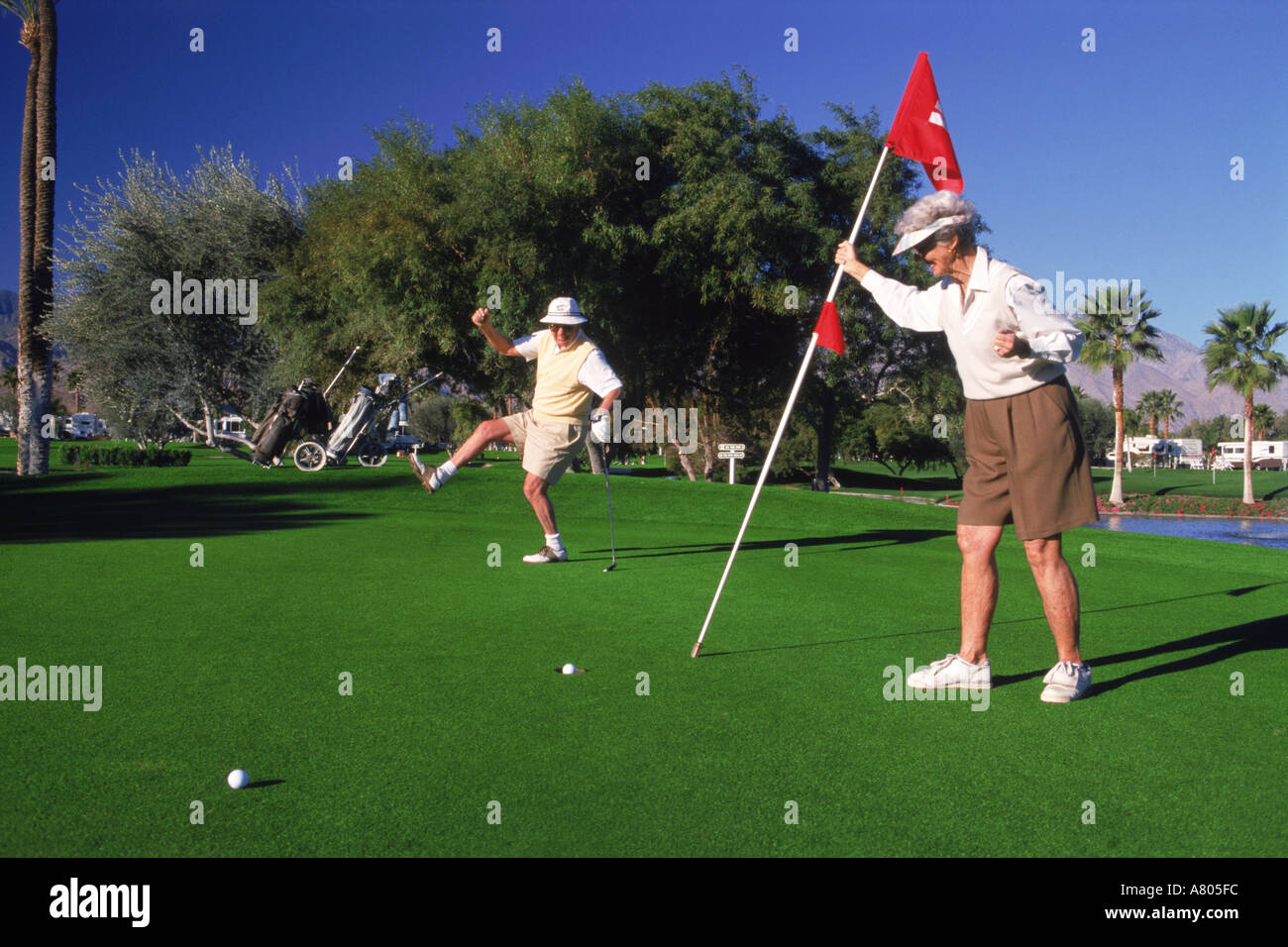 Senior citizens putting on green in Palm Springs California Stock Photo ...