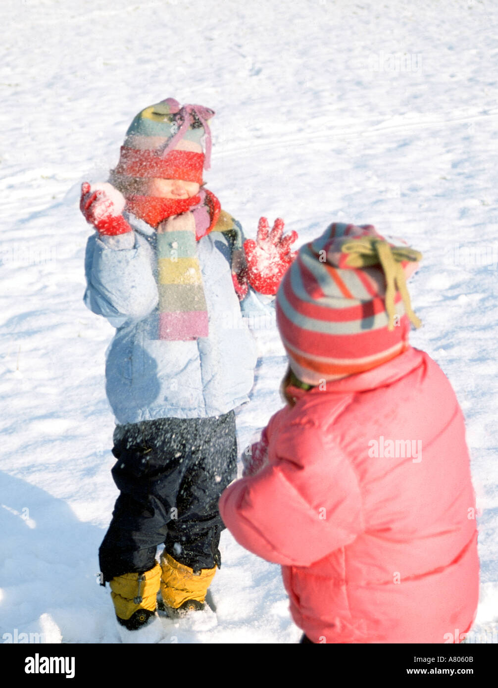 Snowball fight, kids hi-res stock photography and images - Alamy