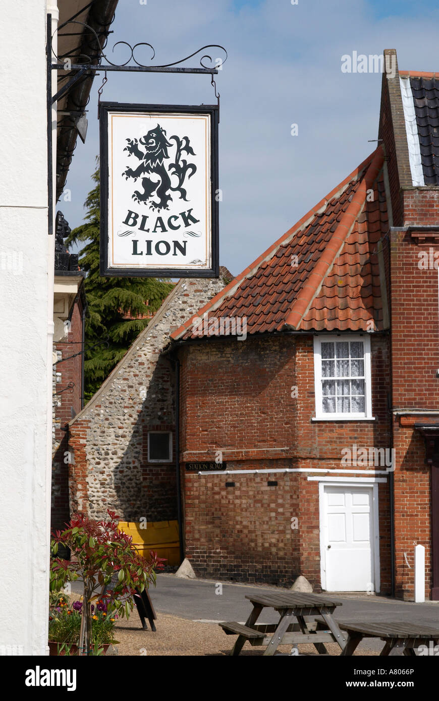 Black Lion pub sign and street scene in Little Walsingham, Norfolk ...