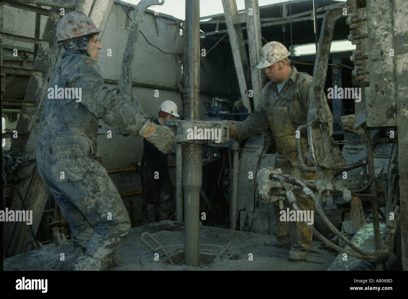Rig workers on derrick rig floor Stock Photo - Alamy