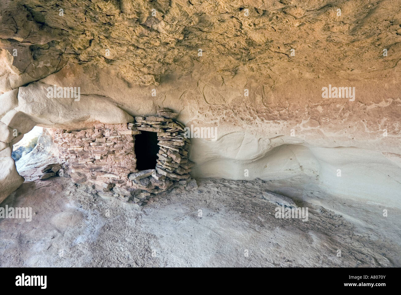 USA, Utah, Canyonlands National Park. Anasazi granary on top of Aztec ...