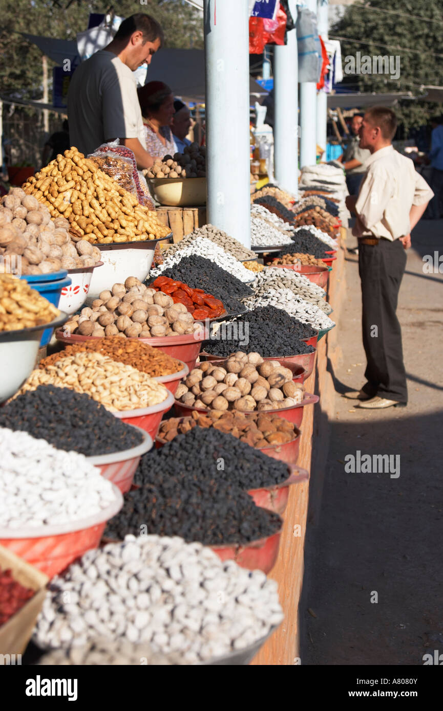 Uzbek Man Buying Nuts At Market Stock Photo - Alamy