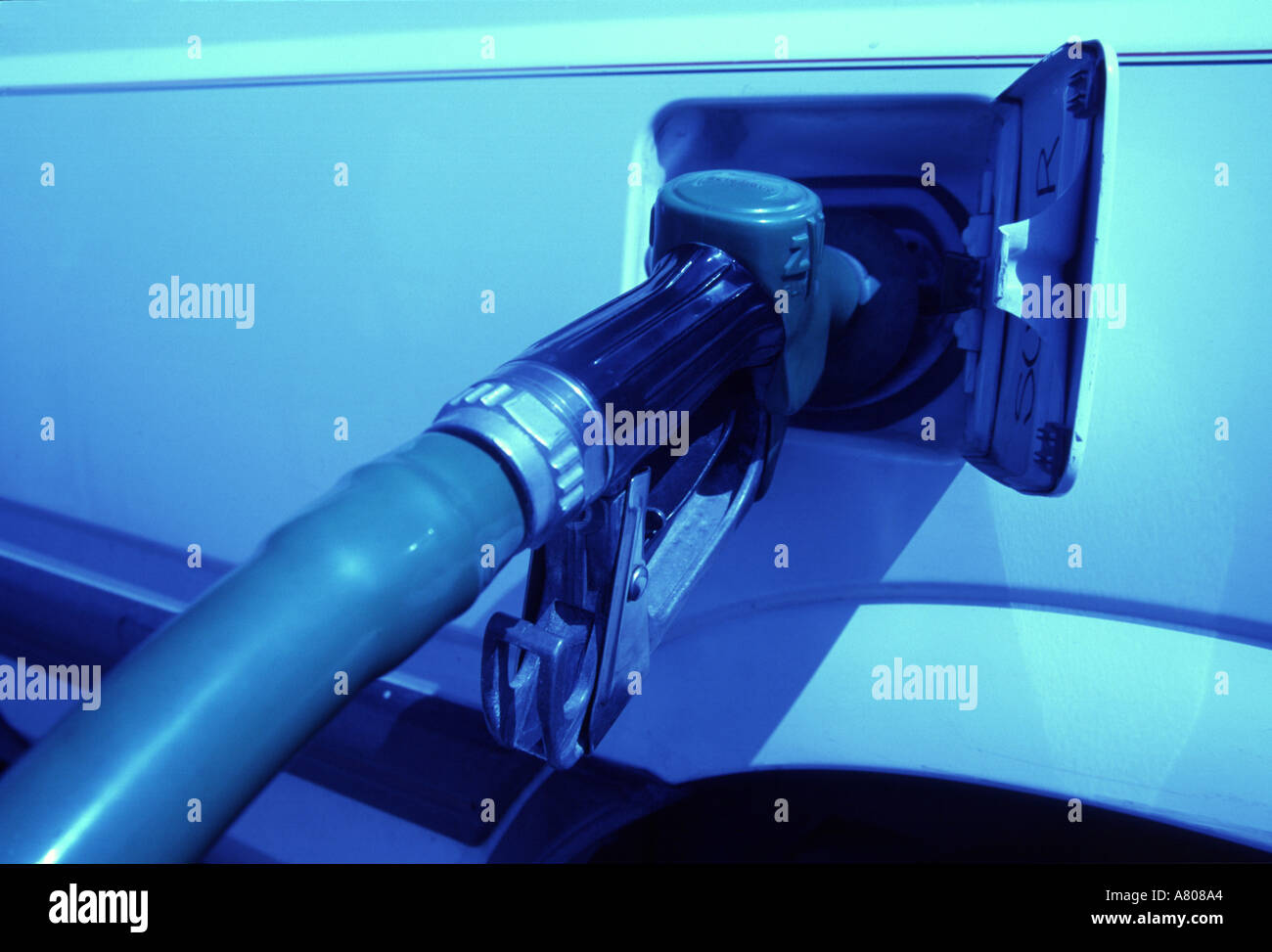 Filling up with petrol gas Stock Photo - Alamy