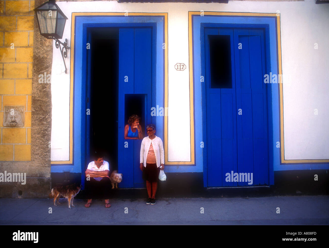 Cuban family outside house in Old Havana Cuba West Indies Stock Photo ...