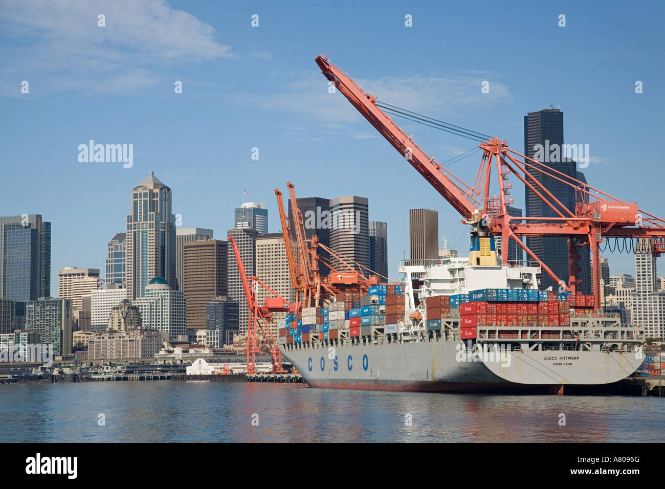 WA, Seattle, Seattle skyline with cargo ship from Elliott Bay Stock ...
