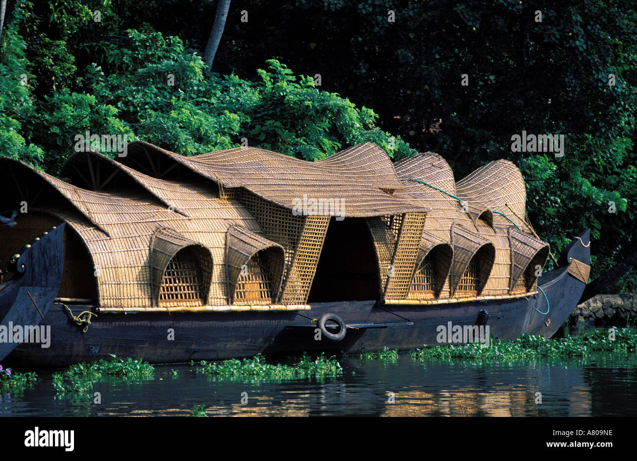 India, Kerala, Backwaters, an old rice boat turned to a luxury hotel ...