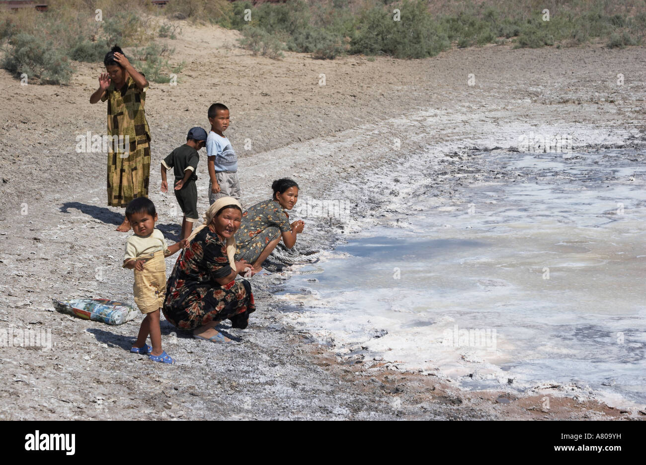 Local Villagers Collecting Salt From Pond At Aral Sea Stock Photo - Alamy