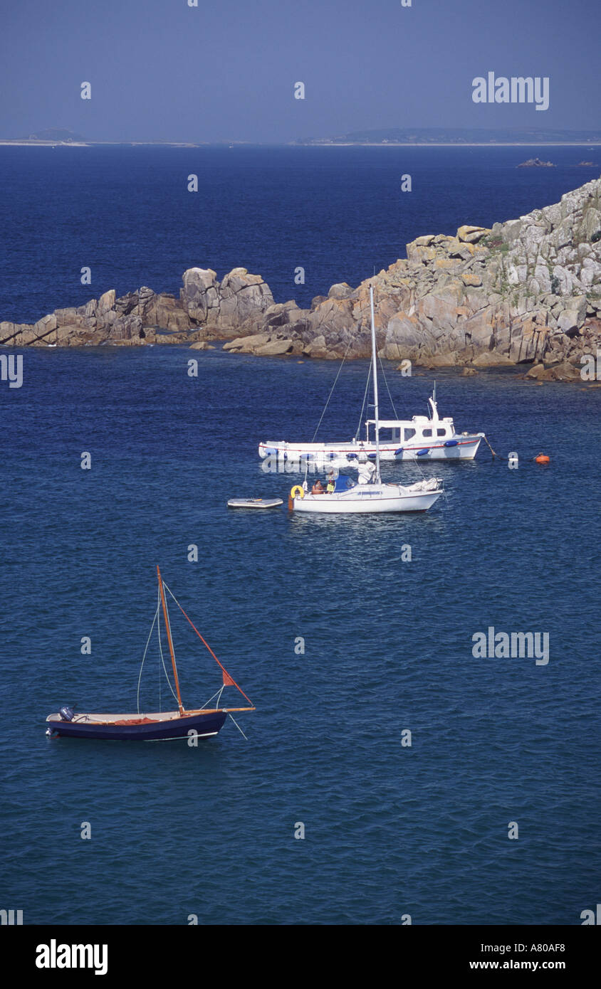 Boats anchored in a cover in the island of St Agnes Isles of Scilly ...