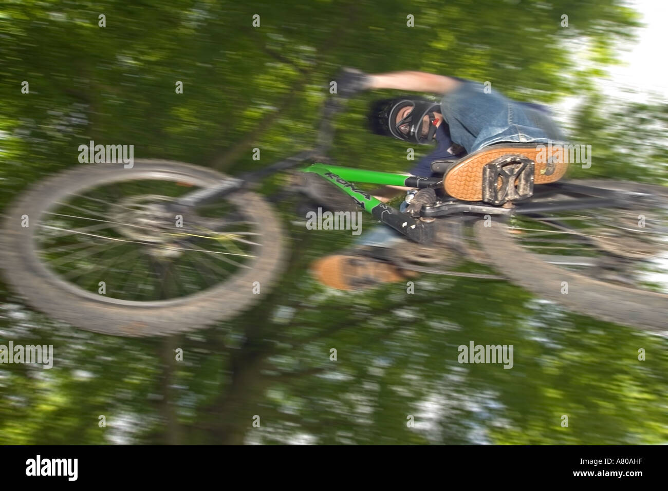 Mountain Biker in mid Air Stock Photo - Alamy