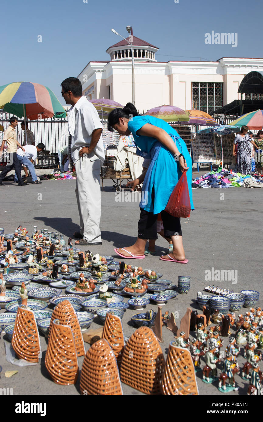 People Looking At Handicrafts At Market Stall Stock Photo - Alamy