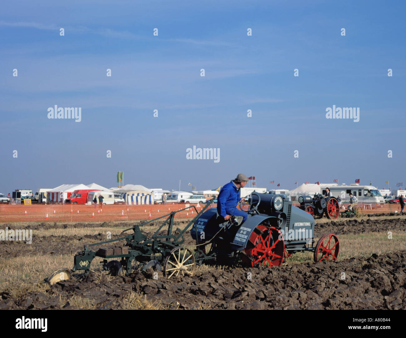 Old fashioned tractor ploughing field hi-res stock photography and ...