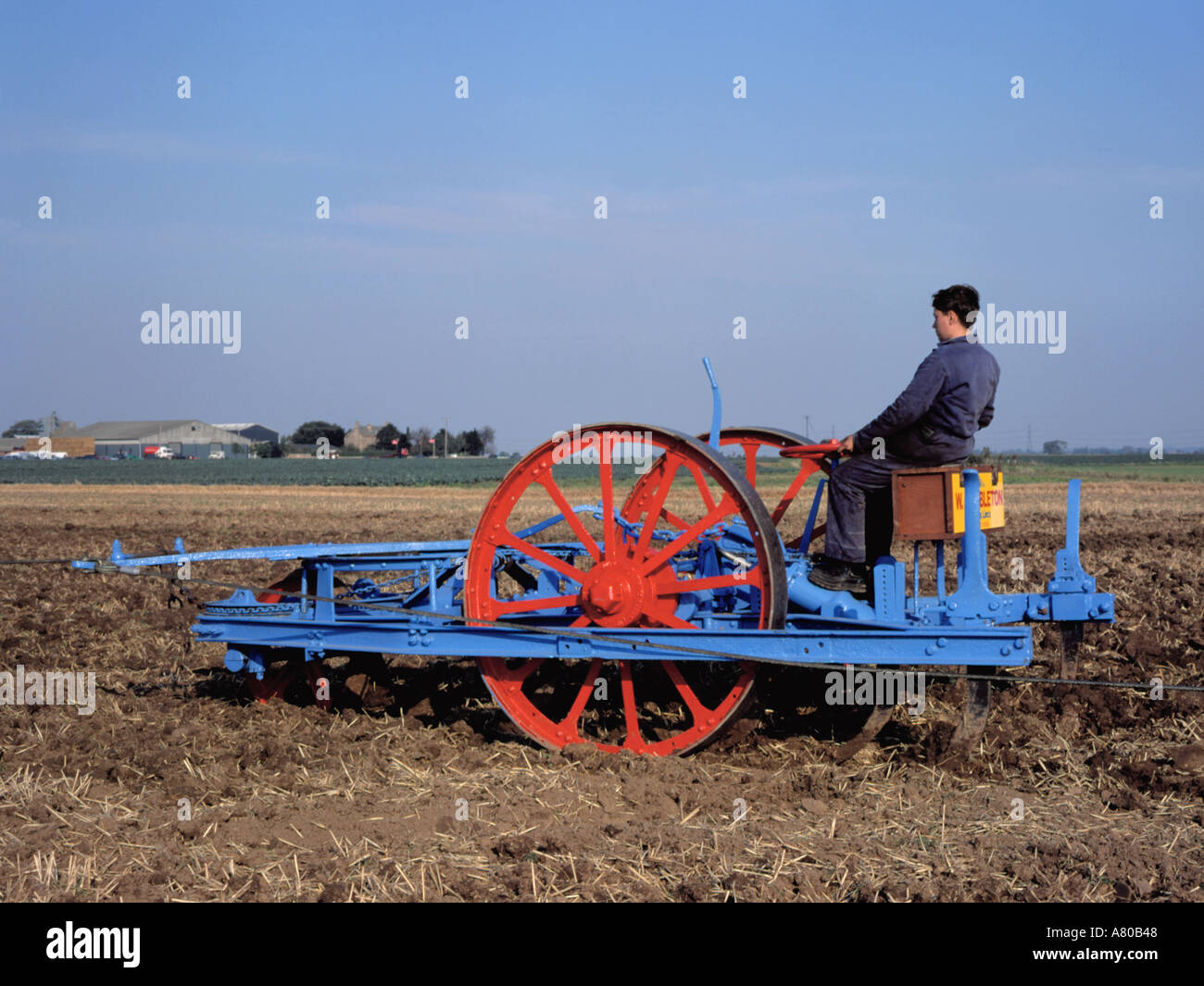 Veteran Fowler cultivator being hauled between a pair of stationary ...
