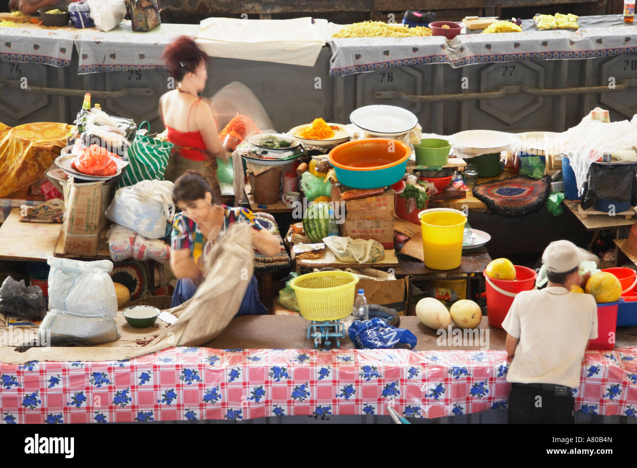 Women Working At Stall In Chorsu Indoor Bazaar Stock Photo - Alamy