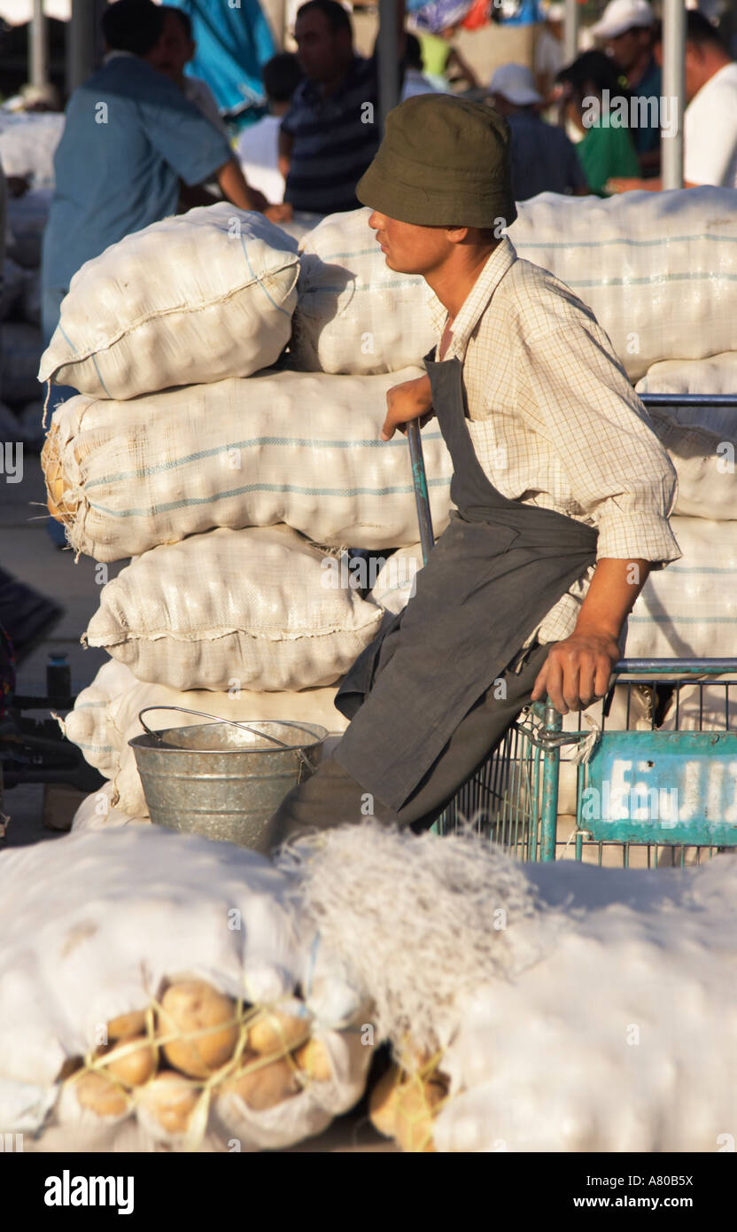 Market Vendor Selling Potatoes Stock Photo - Alamy