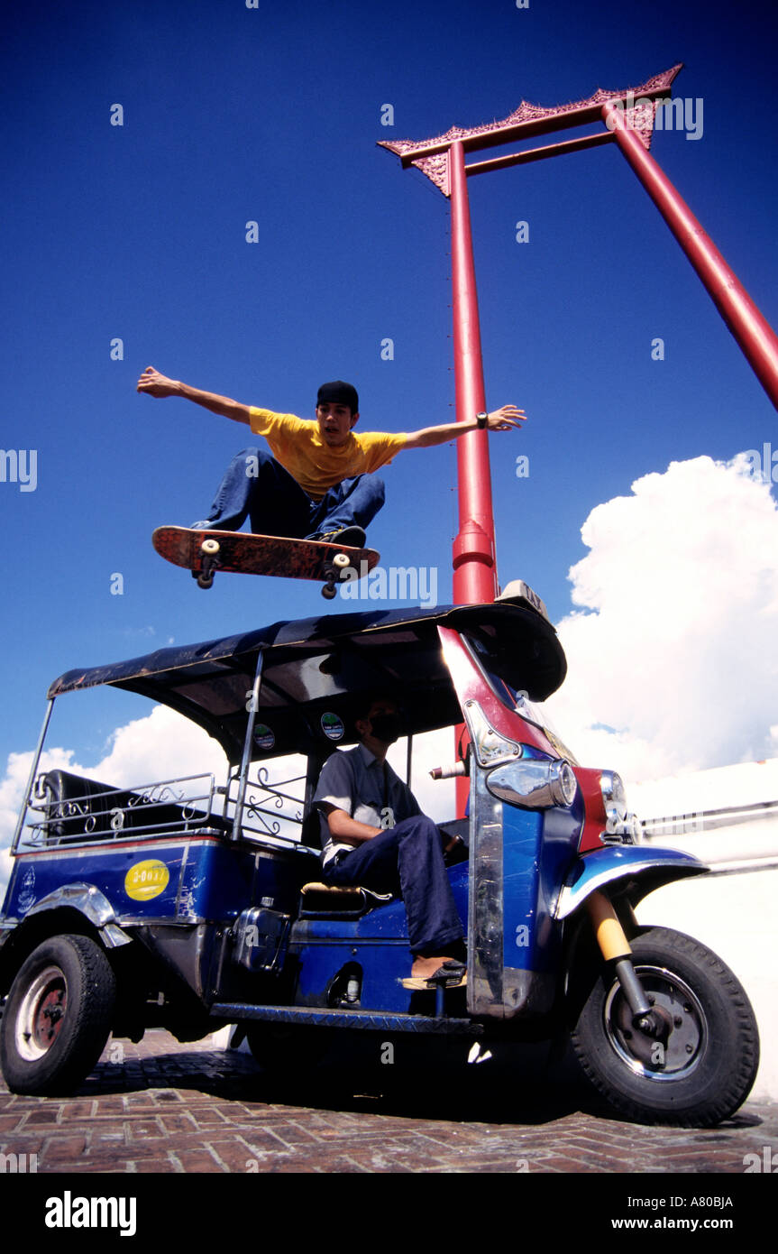 Thailand, Bangkok, skateboard jump above a tuk tuk Stock Photo - Alamy