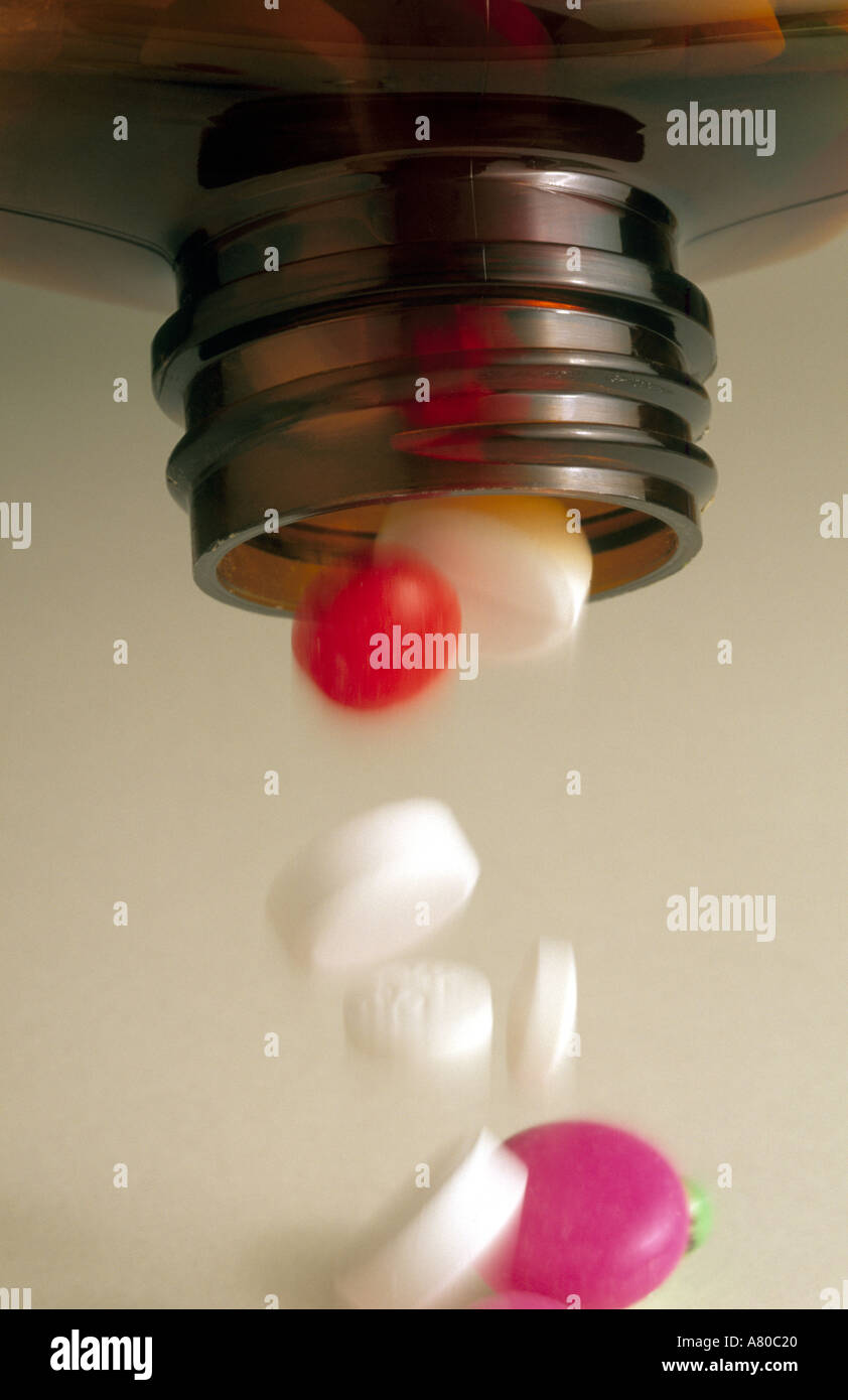 Coloured tablets bottle hi-res stock photography and images - Alamy