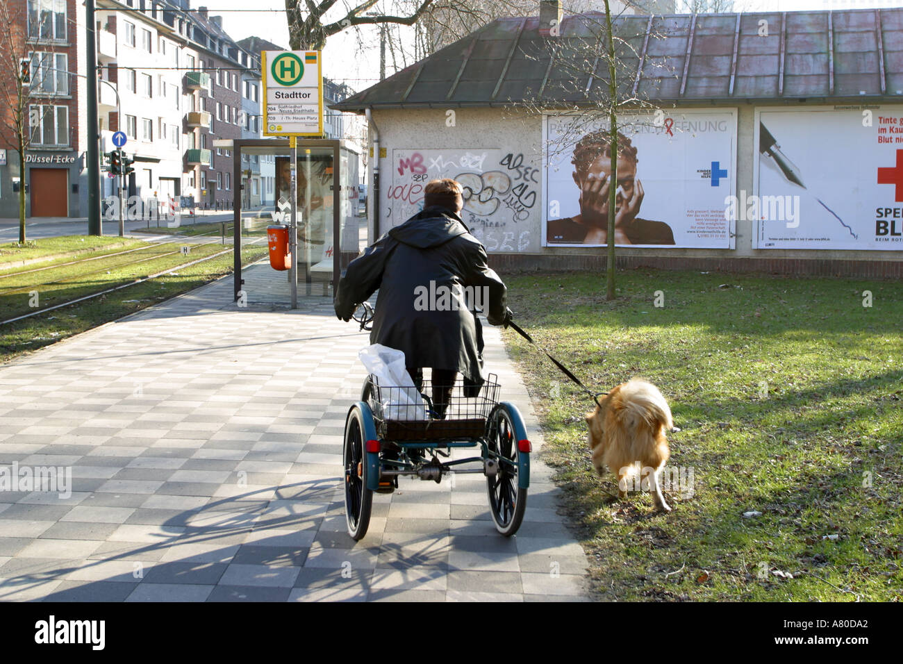 On a tricycle hi-res stock photography and images - Alamy