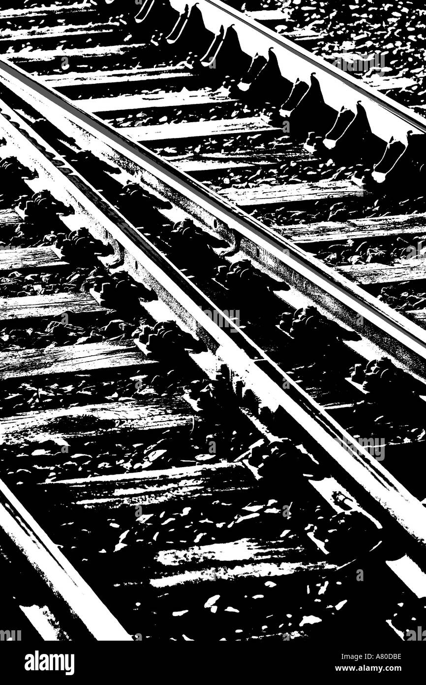 Rail tracks converging from two into one Stock Photo - Alamy