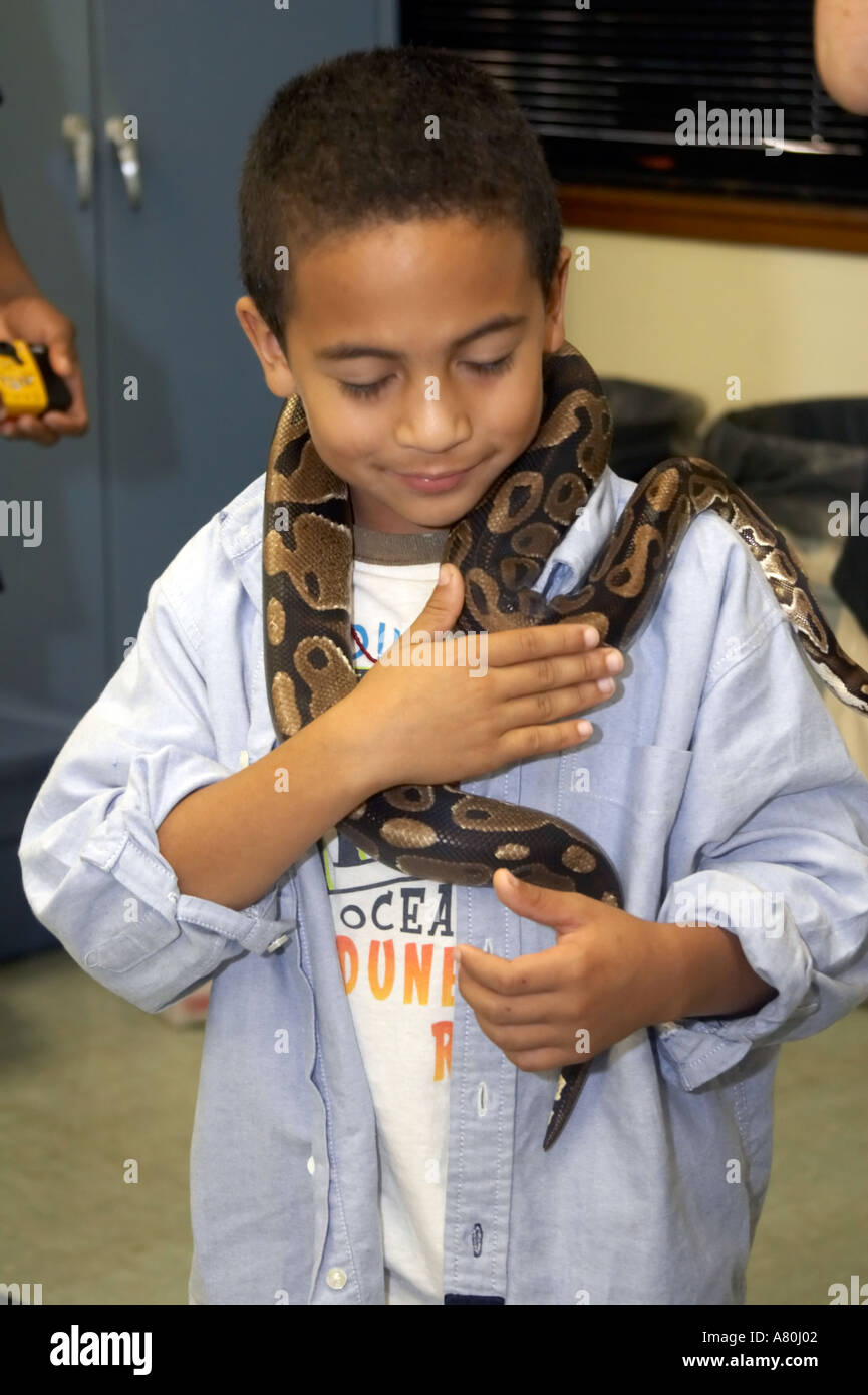 Snake On Shoulders High Resolution Stock Photography and Images - Alamy