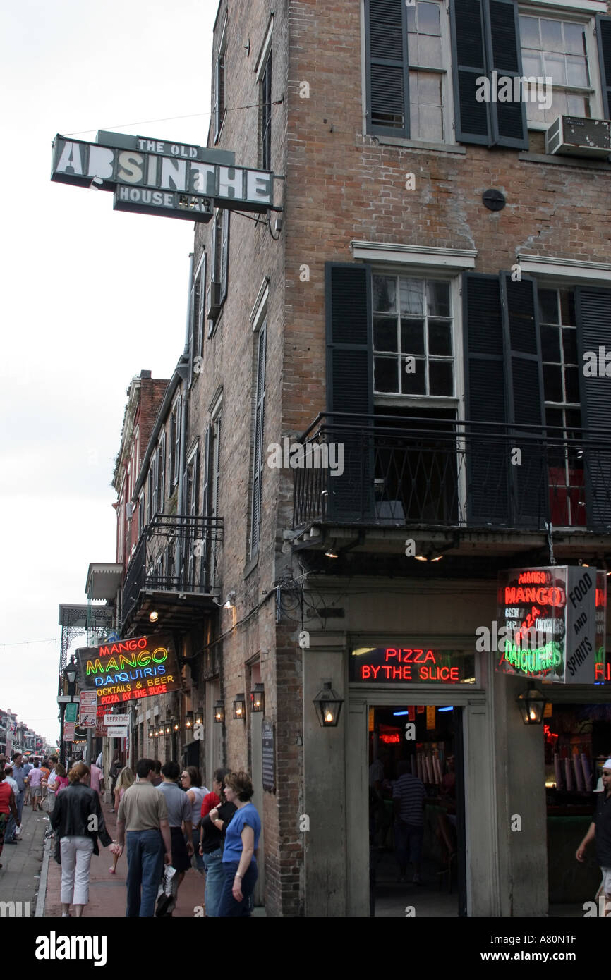 The Old Absinthe House over modern neon signs Stock Photo - Alamy