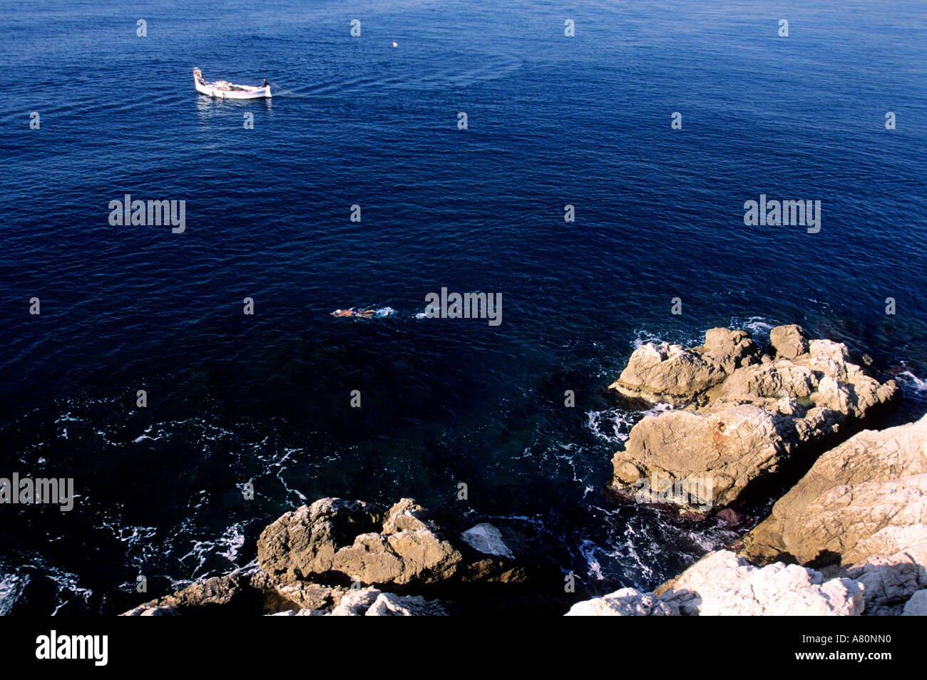 France, Alpes Maritimes, Nice, a diver and his boat over Mediterranean ...
