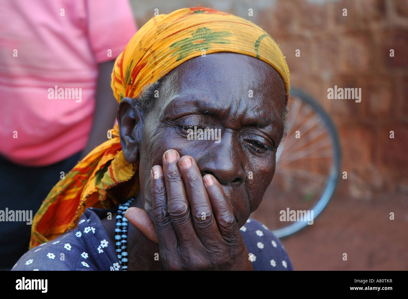 Worried old woman Stock Photo - Alamy