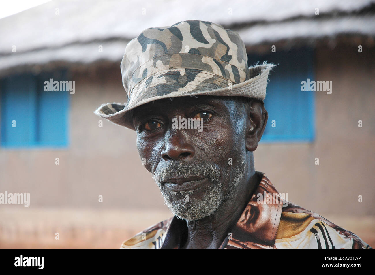 Old man with military hat Stock Photo - Alamy