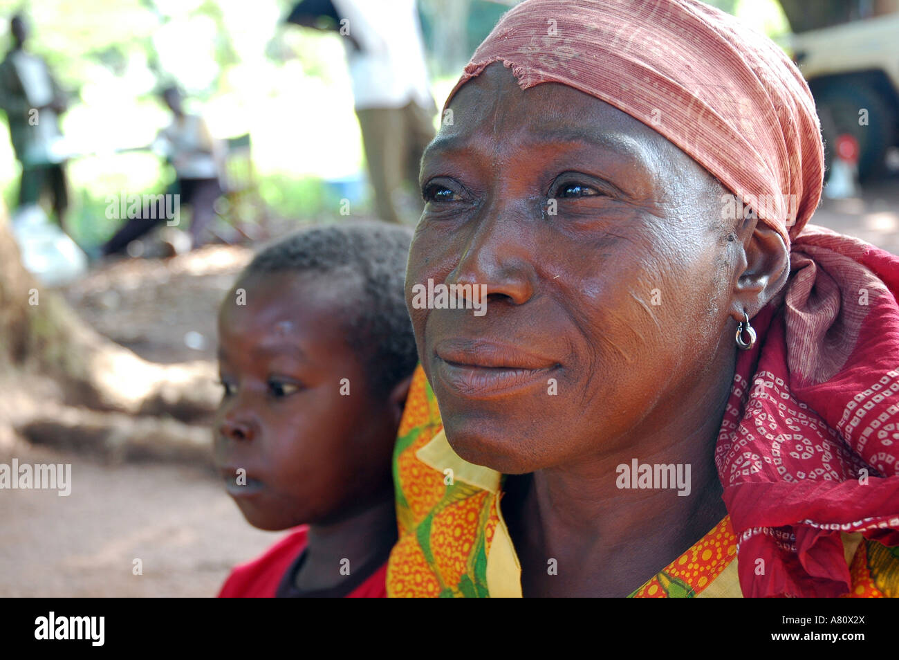 Old lady with traditional face scars Stock Photo - Alamy