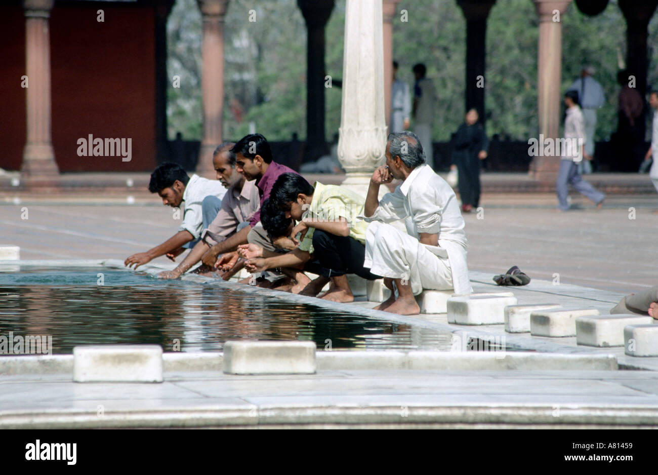 Men washing before prayer at Jami Masjid Old Delhi India Stock Photo ...